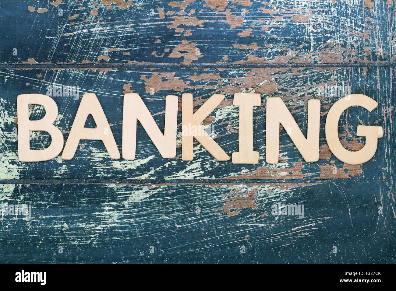 Word banking written with wooden letters on rustic surface Stock Photo ...
