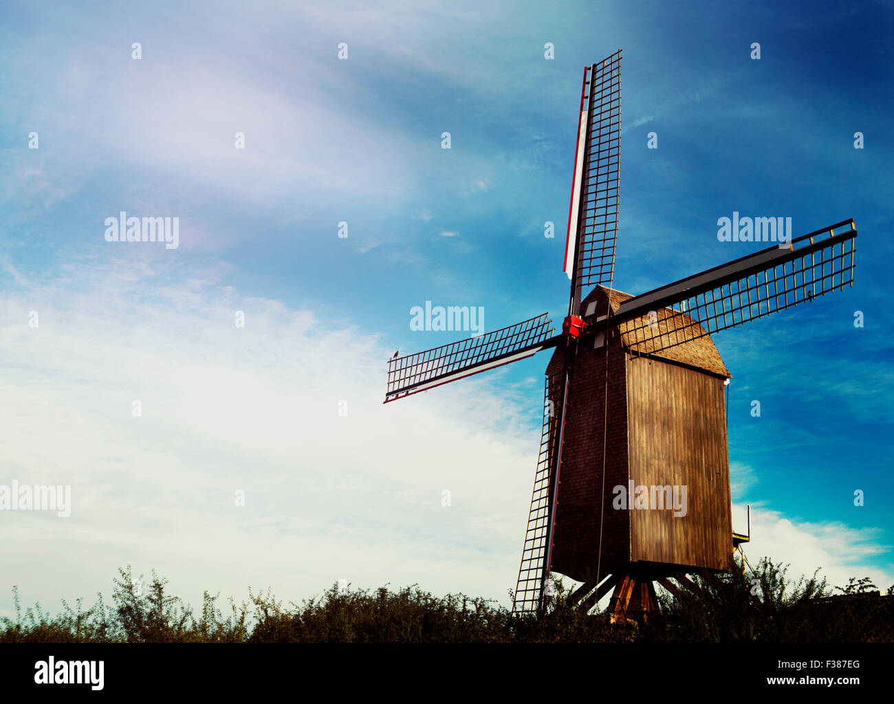 old Belgian windmill on the summer meadow Stock Photo - Alamy