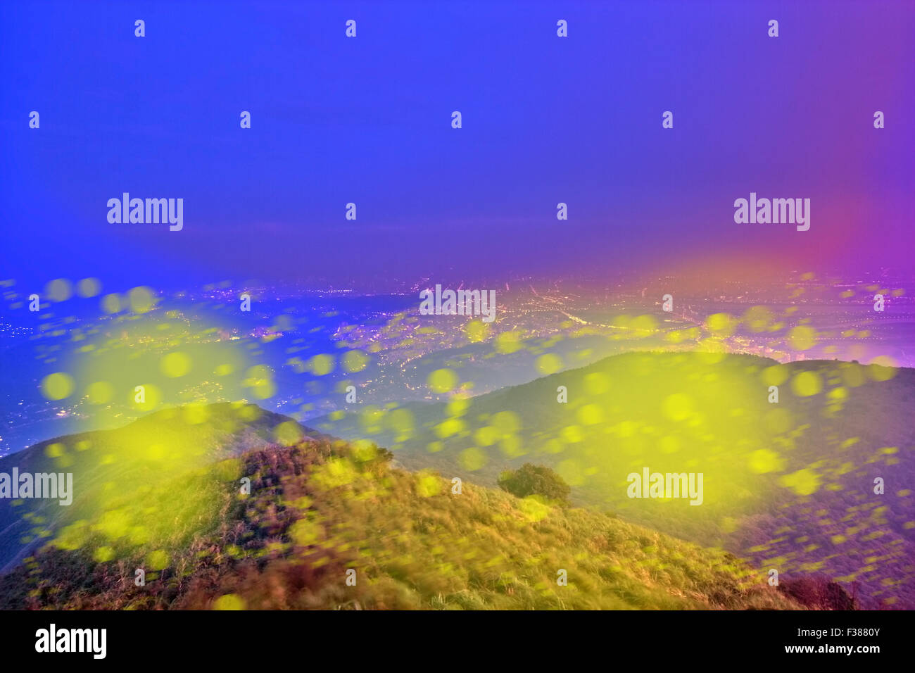 fireflies and mountain depiction Stock Photo - Alamy