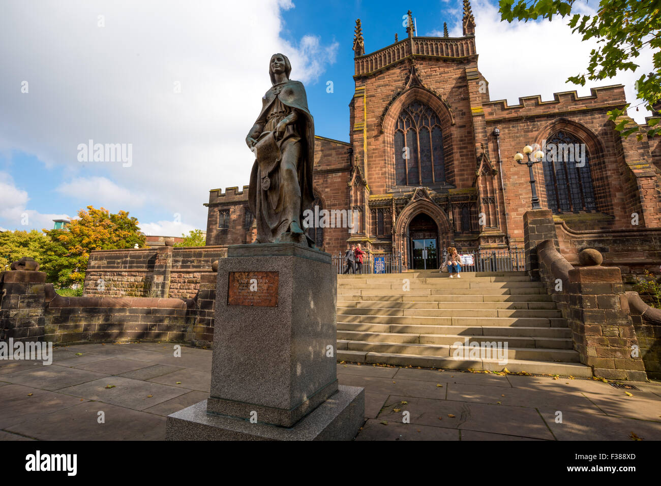 Statue of Lady Wufrun in front of St Peters Church in the town of ...