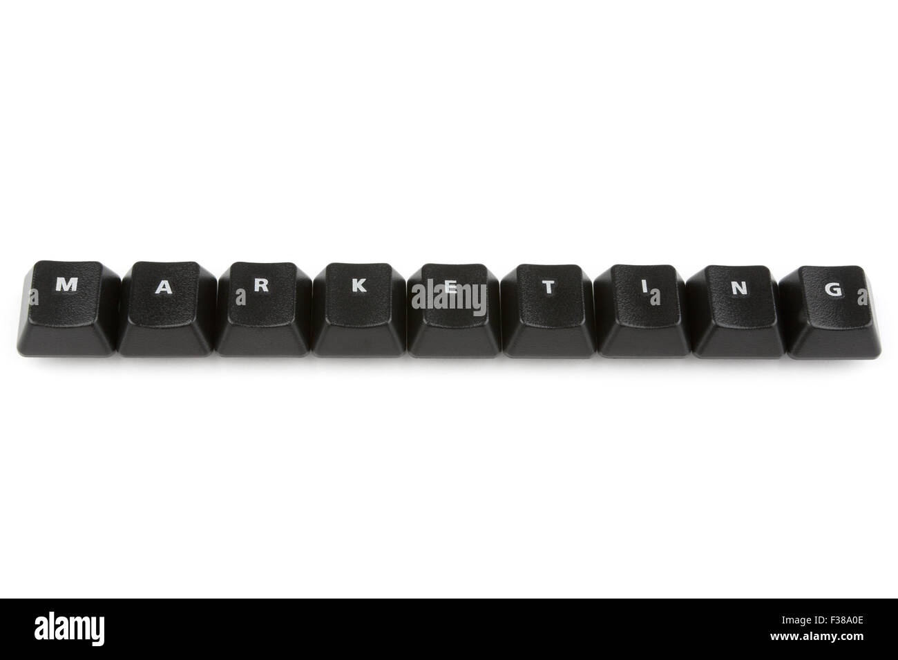 Word marketing formed with computer keyboard keys on white background ...