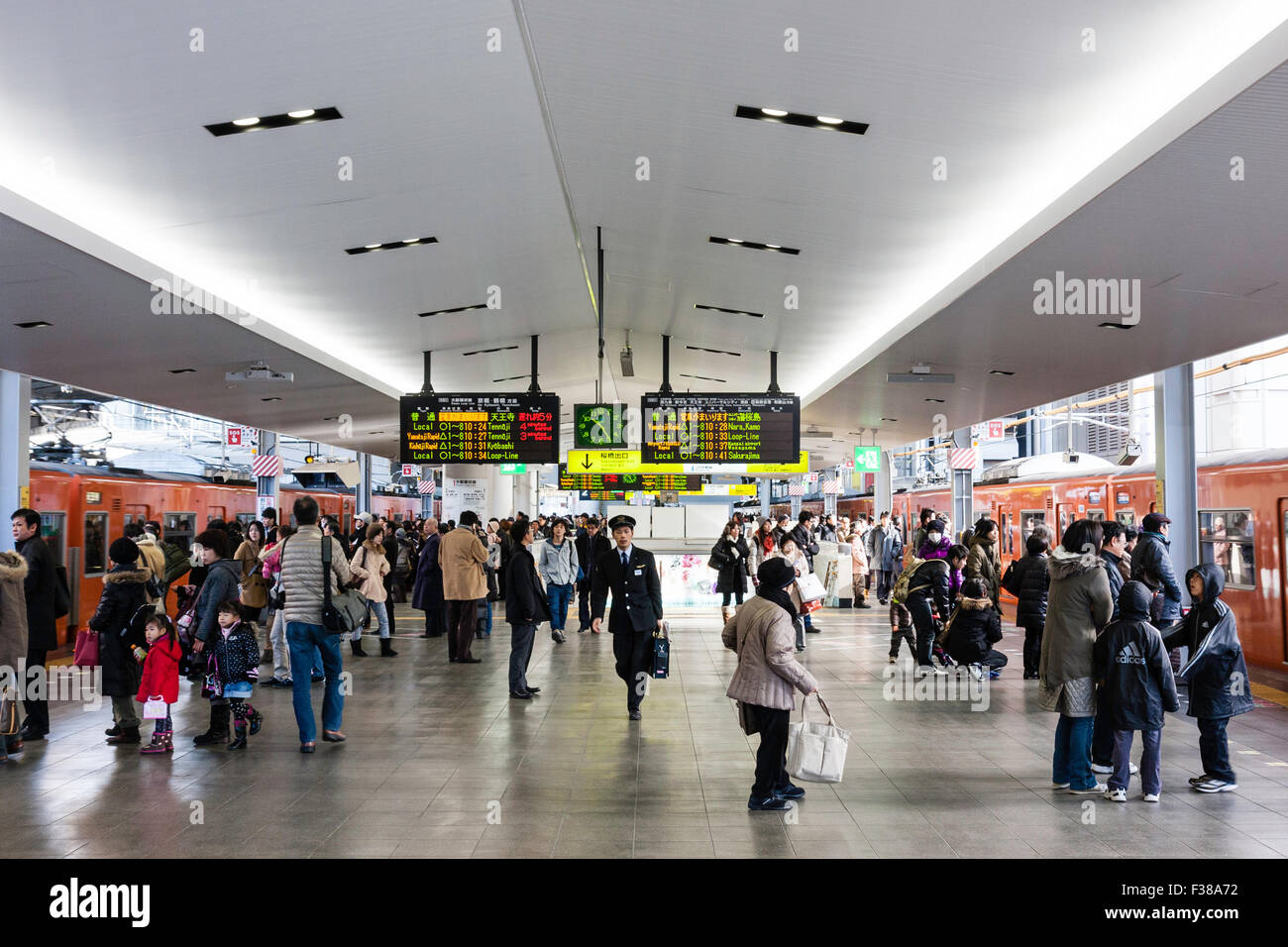 JR Osaka Station City platform for the Osaka Loop trains. View along ...