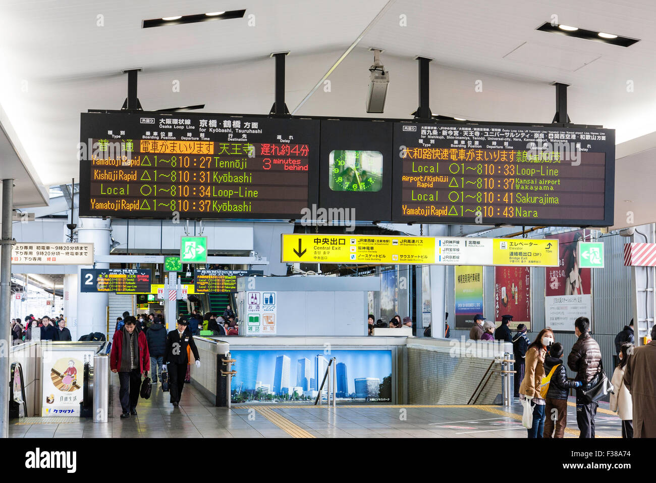 Overhead display sign with details of various trains leaving from ...