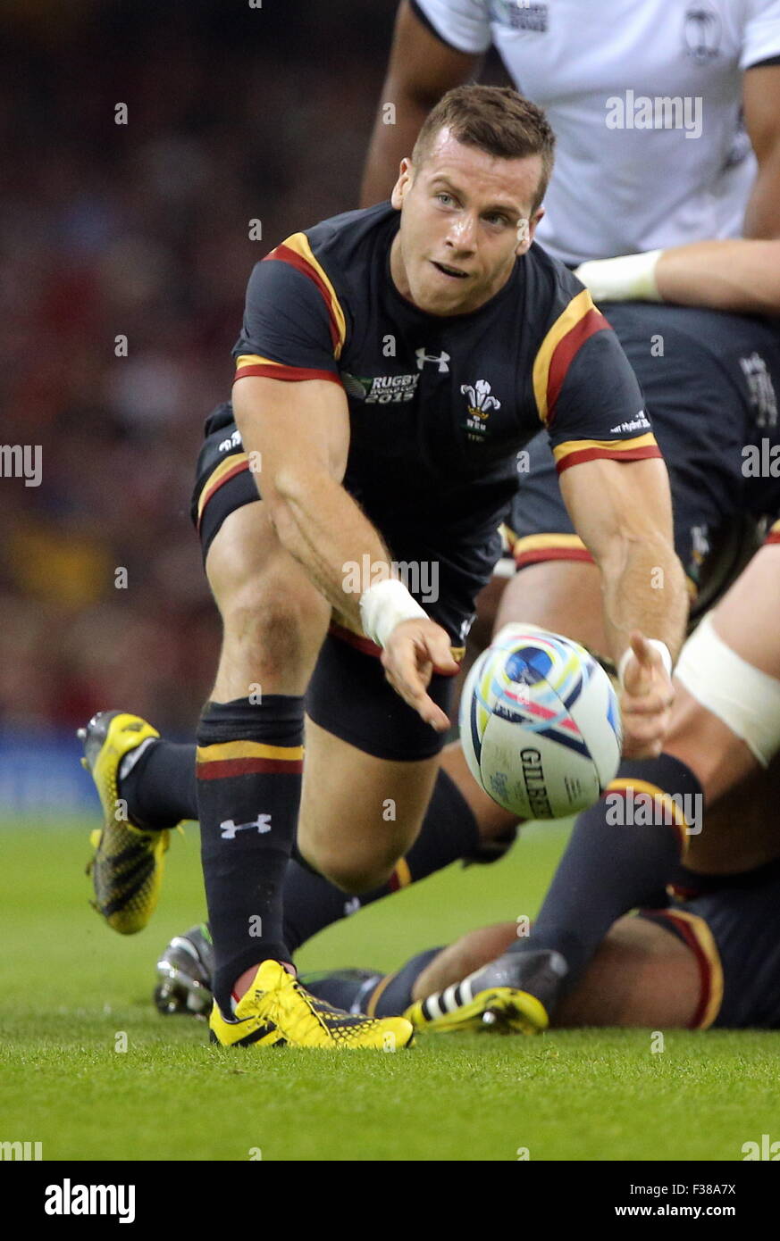 Cardiff, UK. Thursday 01 October 2015 Gareth Davies of Wales passes the ...