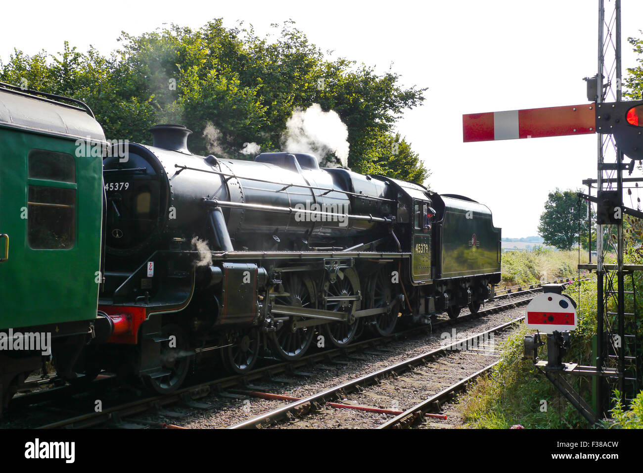 Stanier Black Five 4-6- 0 steam locomotive number 45379 pulls away in ...