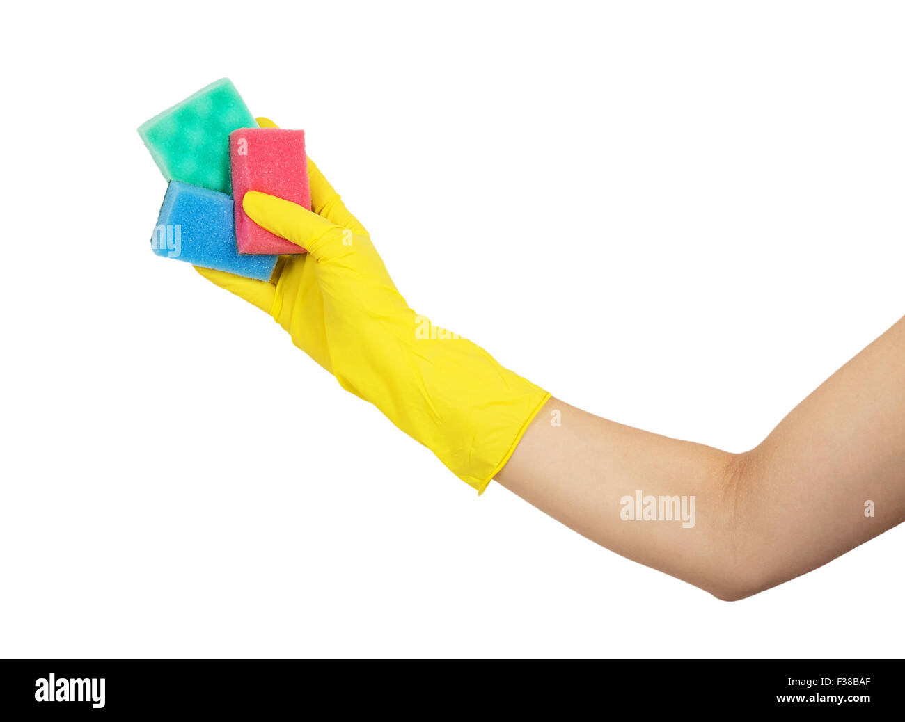 Female hand in yellow glove holding with colorful sponges isolated on ...