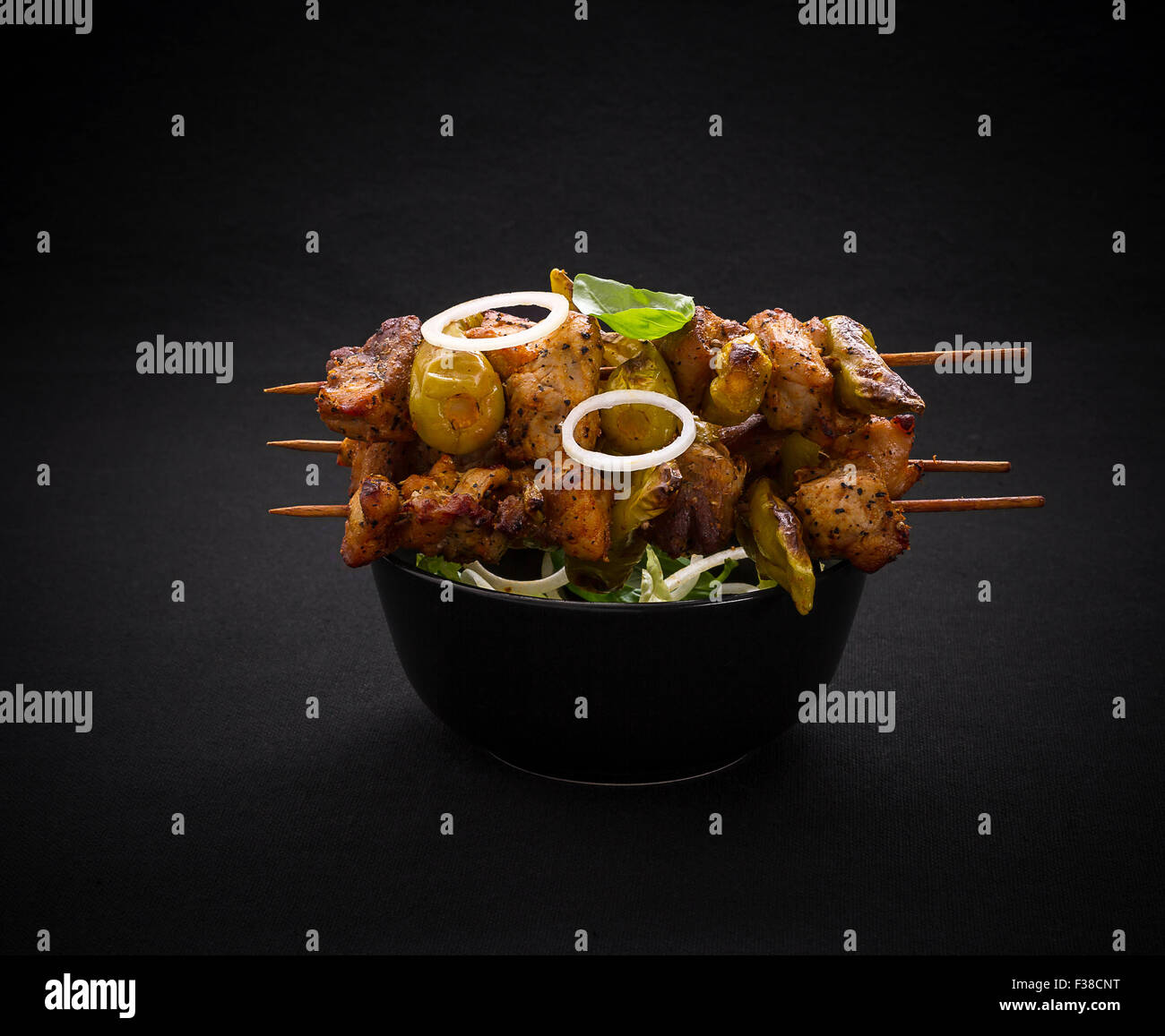 Three skewers with meat, pepperoni on black, horizontal Stock Photo - Alamy
