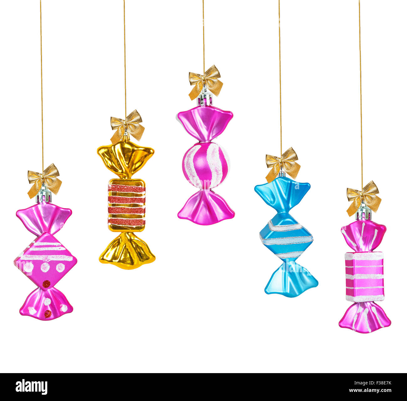 Bright Christmas tree toy candies with bow isolated on white background ...