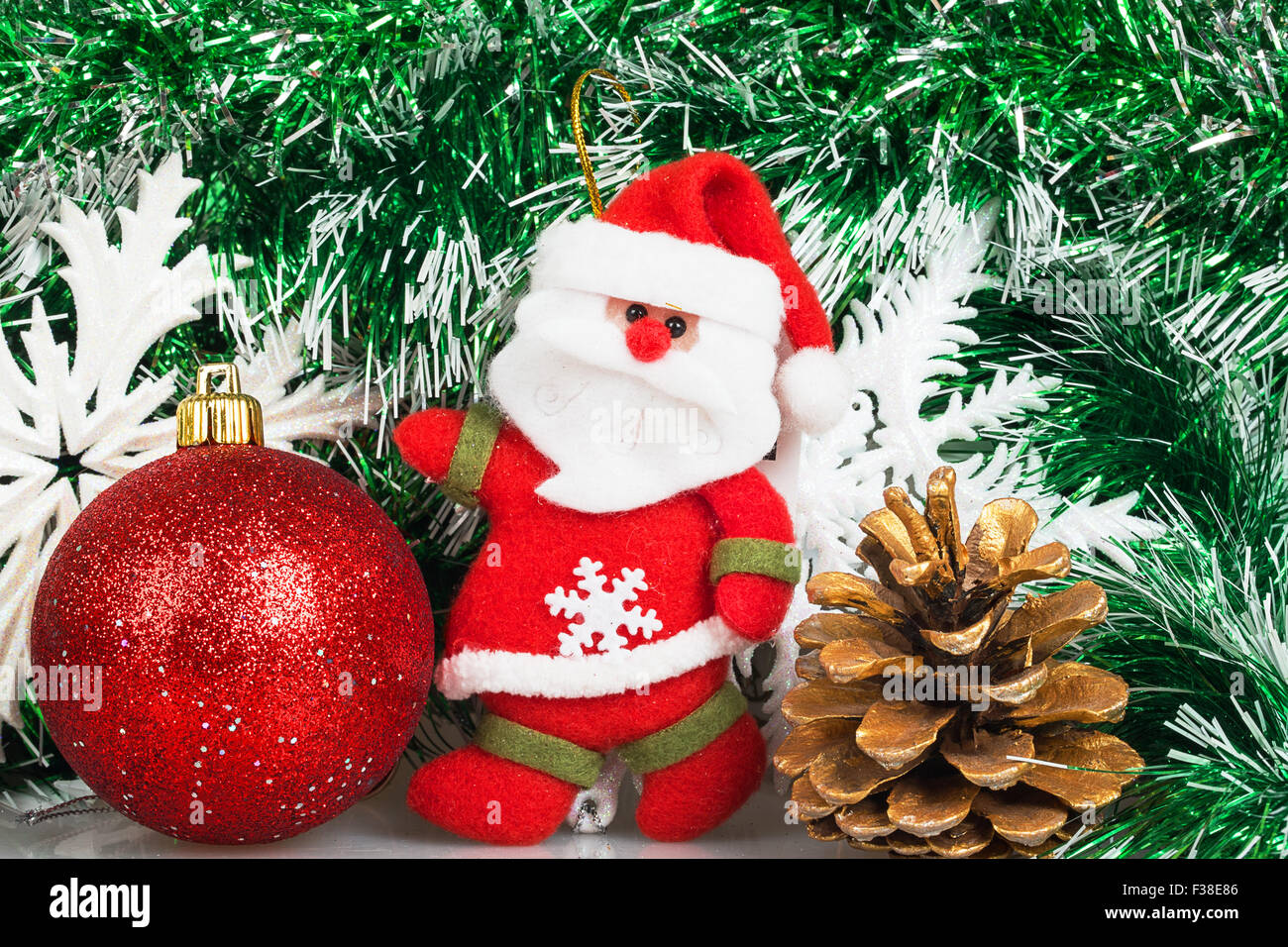 Santa Claus with Christmas red ball, bump and white snowflakes on a ...