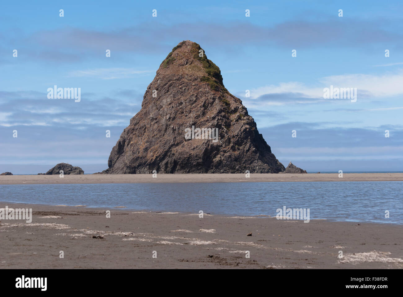 Portrait of pointed rock off the Oregon Coast Stock Photo - Alamy