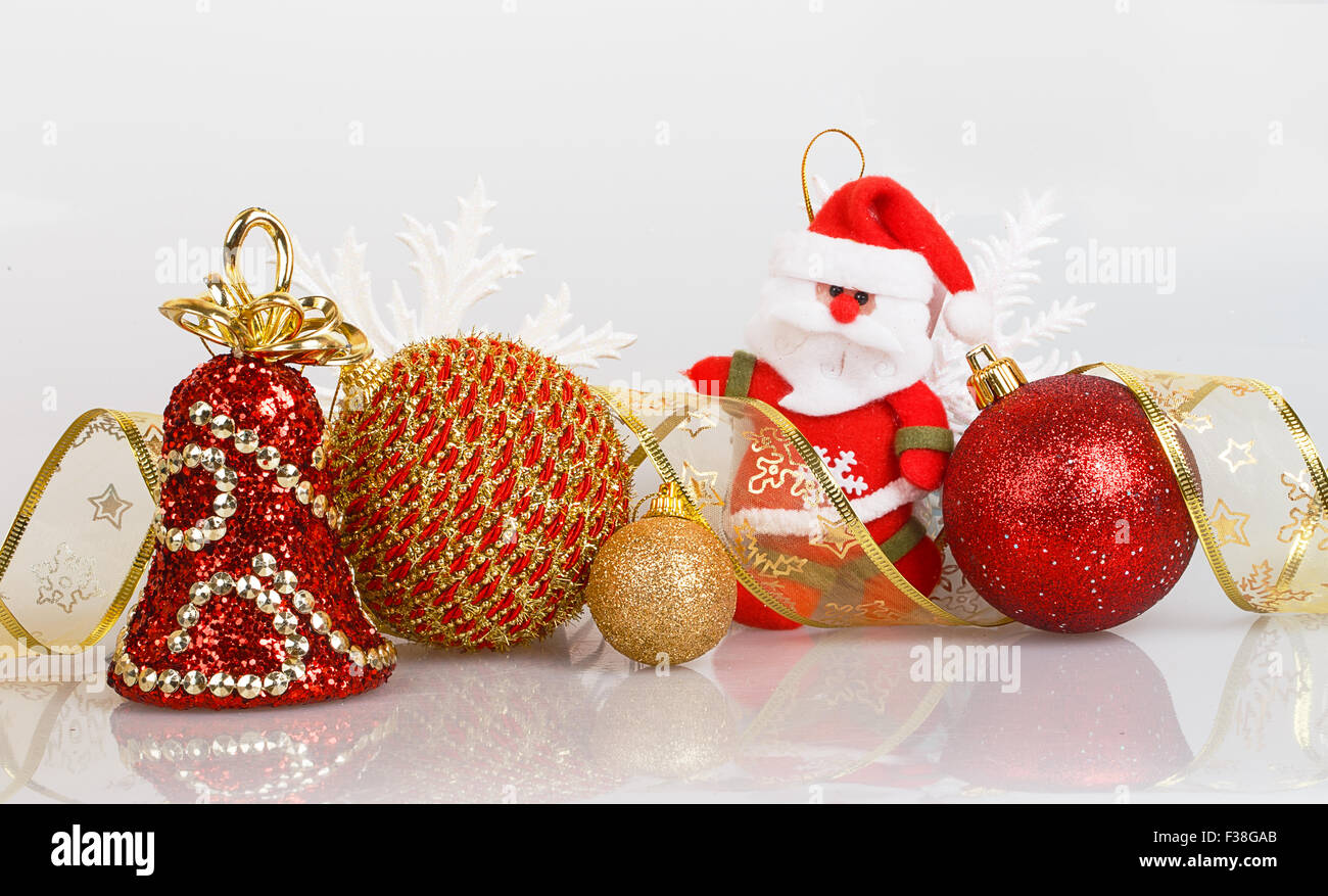 Santa Claus with Christmas balls and white snowflakes on white ...