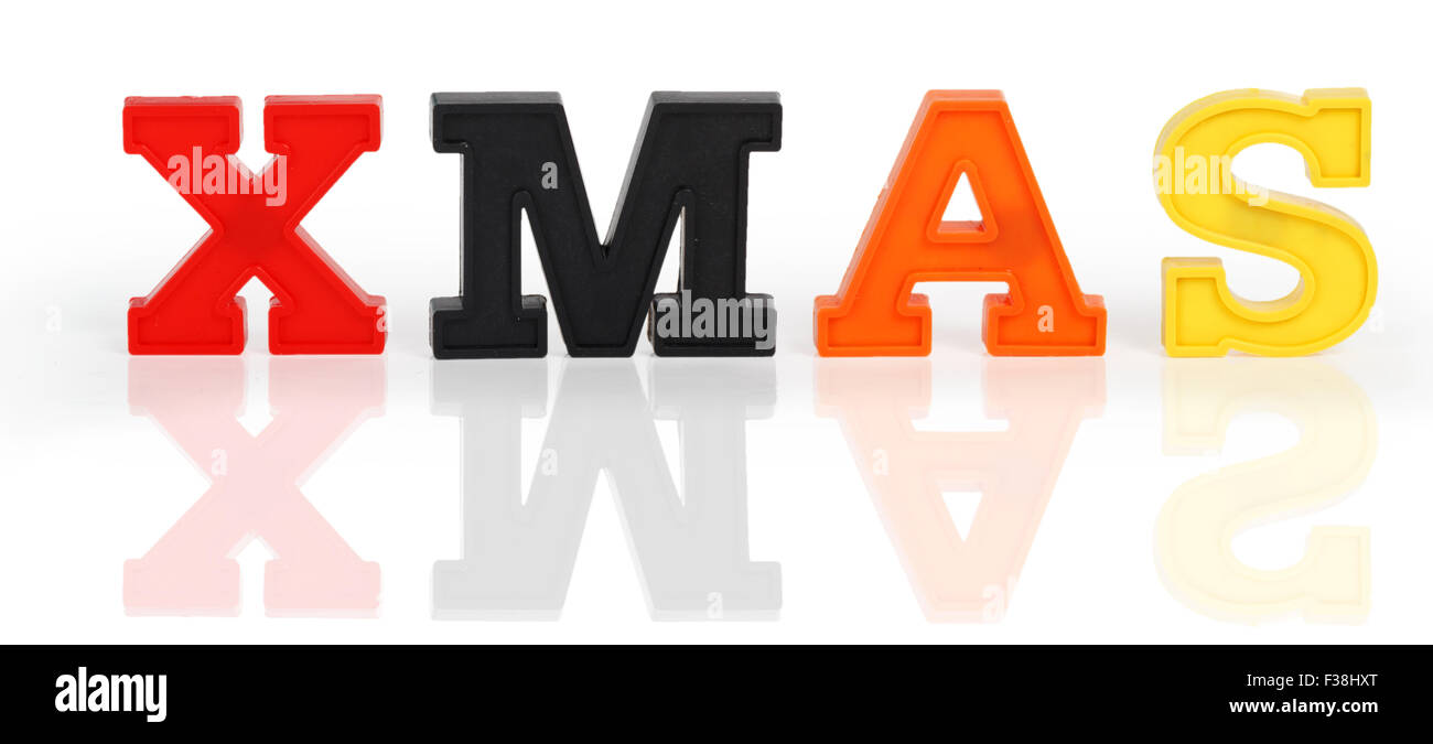 Text "XMAS" of plastic letters isolated on white background Stock Photo ...