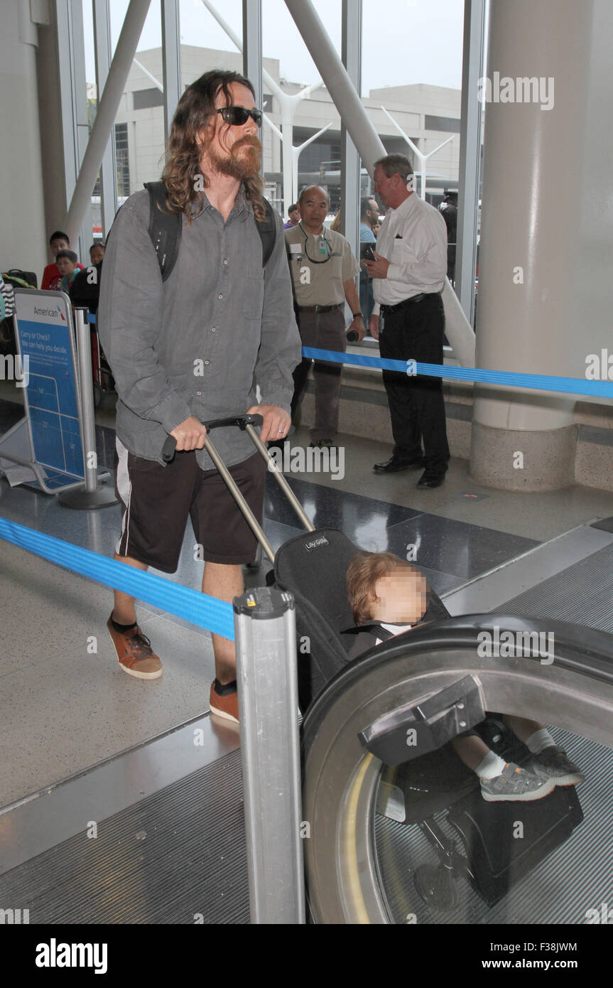 Christian Bale arrives at Los Angeles International Airport (LAX) with ...