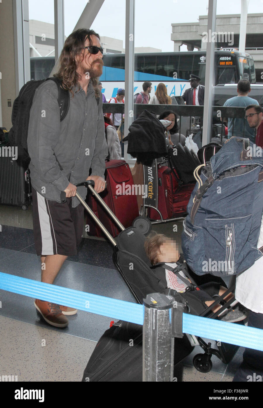 Christian Bale arrives at Los Angeles International Airport (LAX) with ...