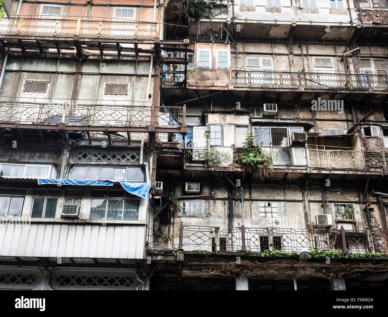 House front, balcony, run-down , decayed, Mumbai, India Stock Photo - Alamy