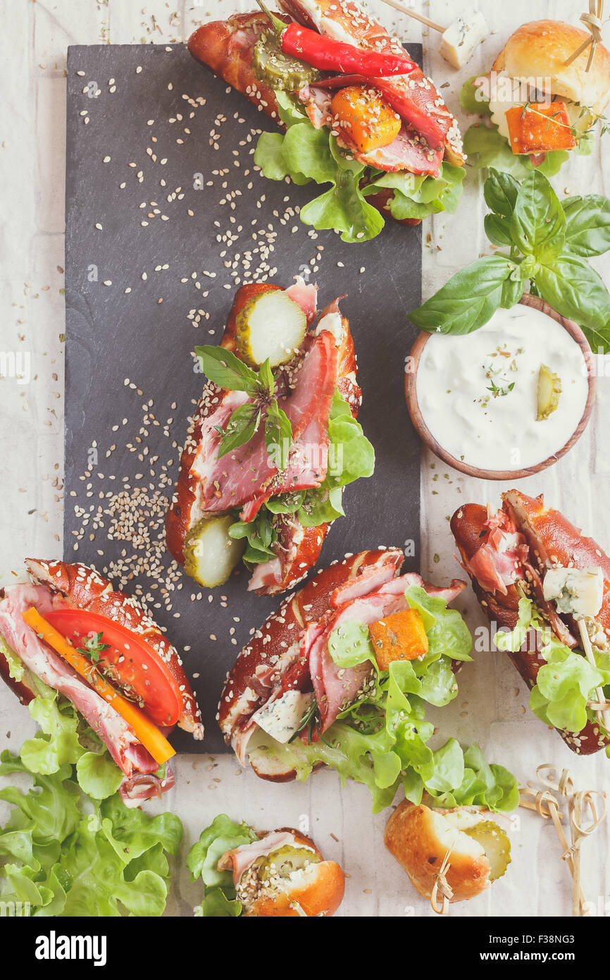 Sandwiches. An assortment of mini sandwiches with variety of filling on ...