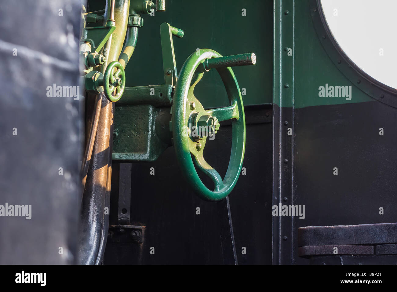 Detail of the brass front valve of an old steam train boiler Stock ...
