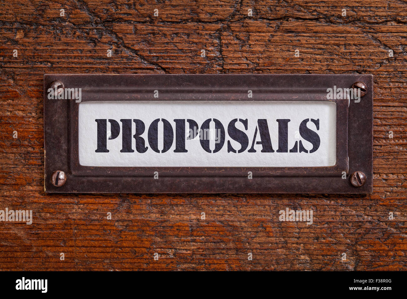proposals - file cabinet label, bronze holder against grunge and ...
