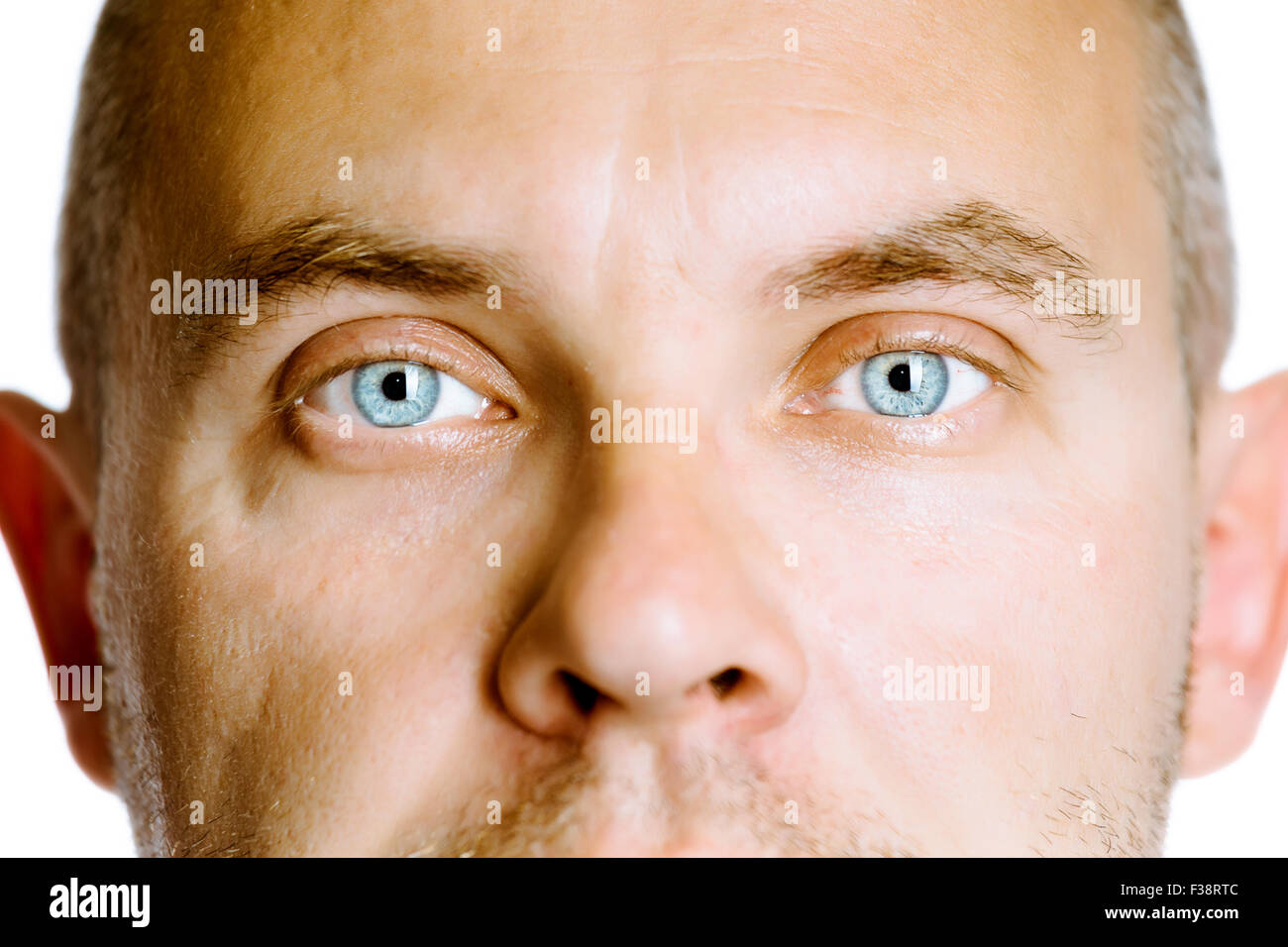 The blue-eyed man. The face close up. Studio. isolated Stock Photo - Alamy