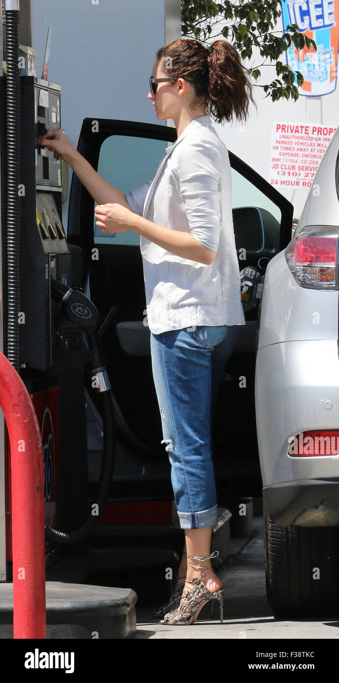 Emmy Rossum spotted pumping gas and running errands in Beverly Hills ...