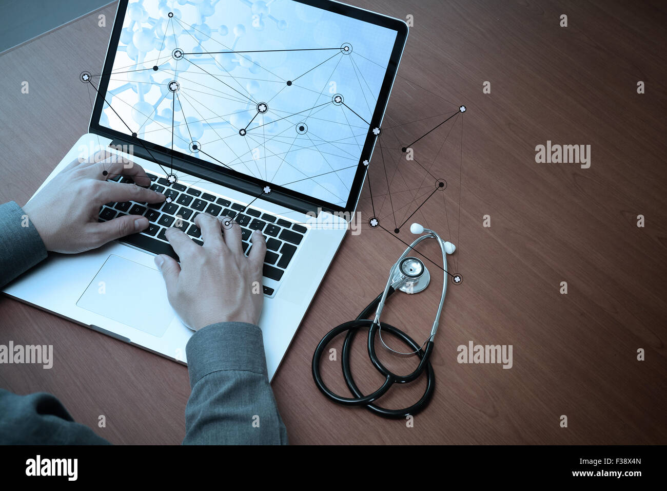 top view of Medicine doctor hand working with modern computer and smart ...