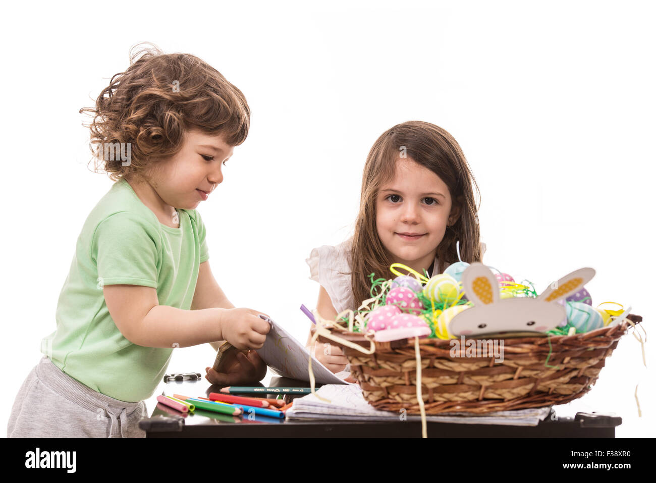 Two little kids at kindergarten isolated on white background Stock ...