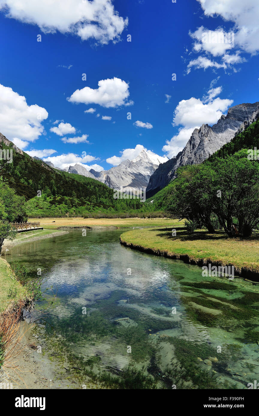 Tibet snow mountain with river in China Stock Photo - Alamy