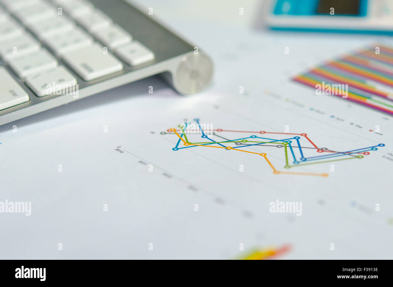 Financial paper charts and graphs on the table Stock Photo - Alamy