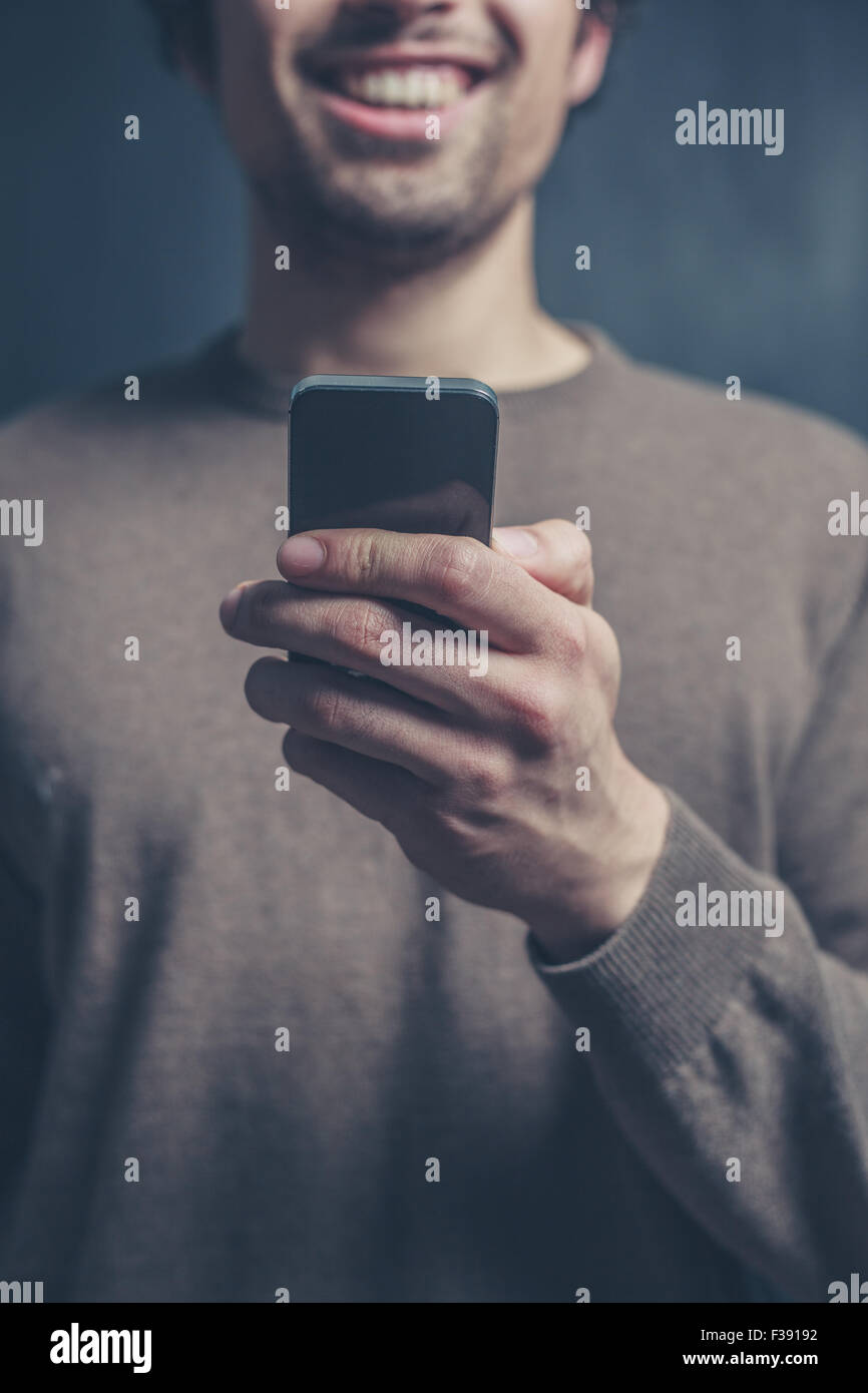 Relaxed man using smart hi-res stock photography and images - Alamy