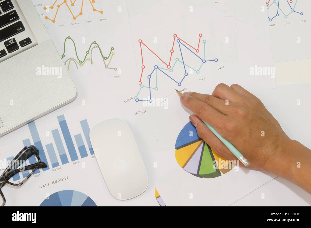 Business documents, computers and graph Stock Photo - Alamy
