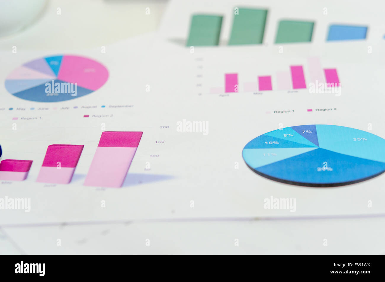 Financial paper charts and graphs on the table Stock Photo - Alamy