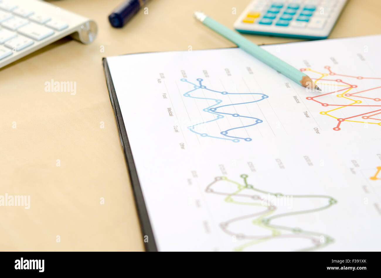 Financial paper charts and graphs on the table Stock Photo - Alamy