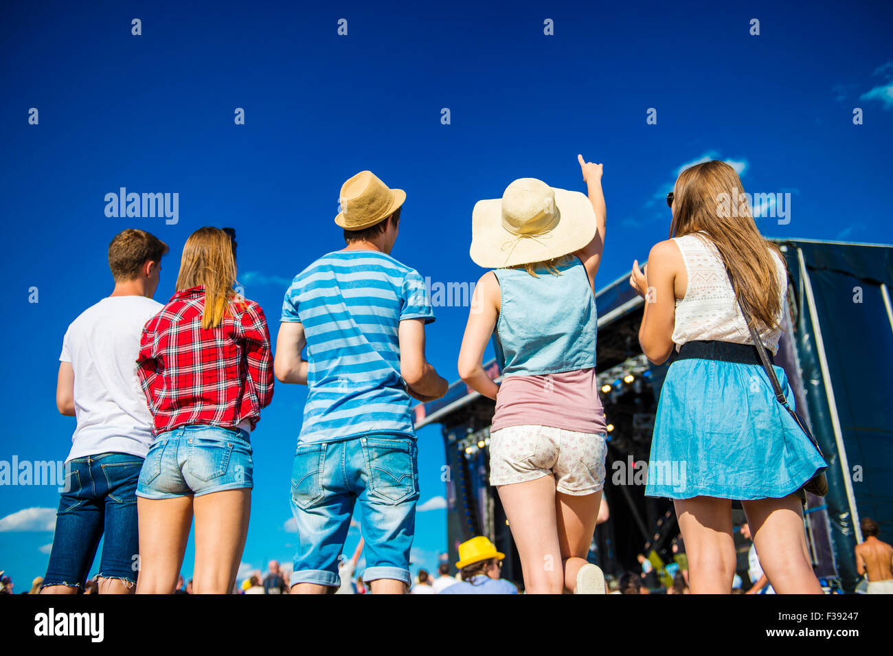 Beautiful teens at summer festival Stock Photo - Alamy