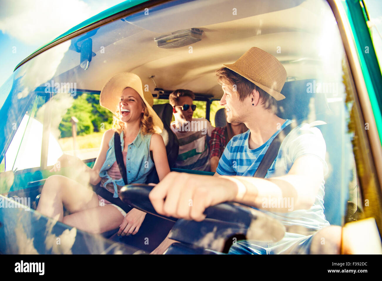 Beautiful young people on a road trip Stock Photo - Alamy