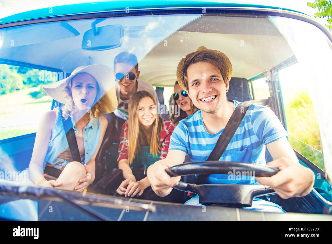 Beautiful young people on a road trip Stock Photo - Alamy