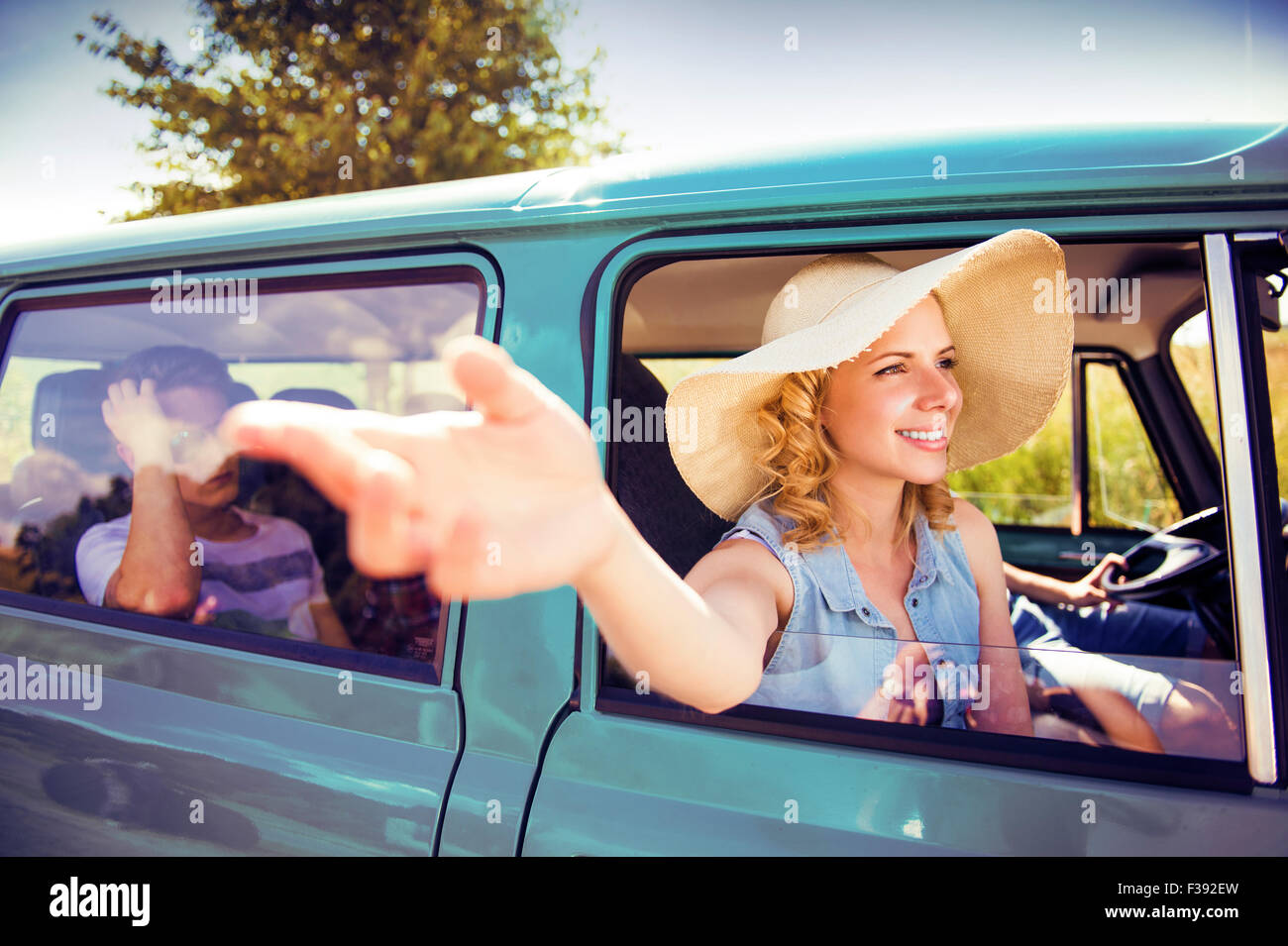 Young people on a road trip Stock Photo - Alamy