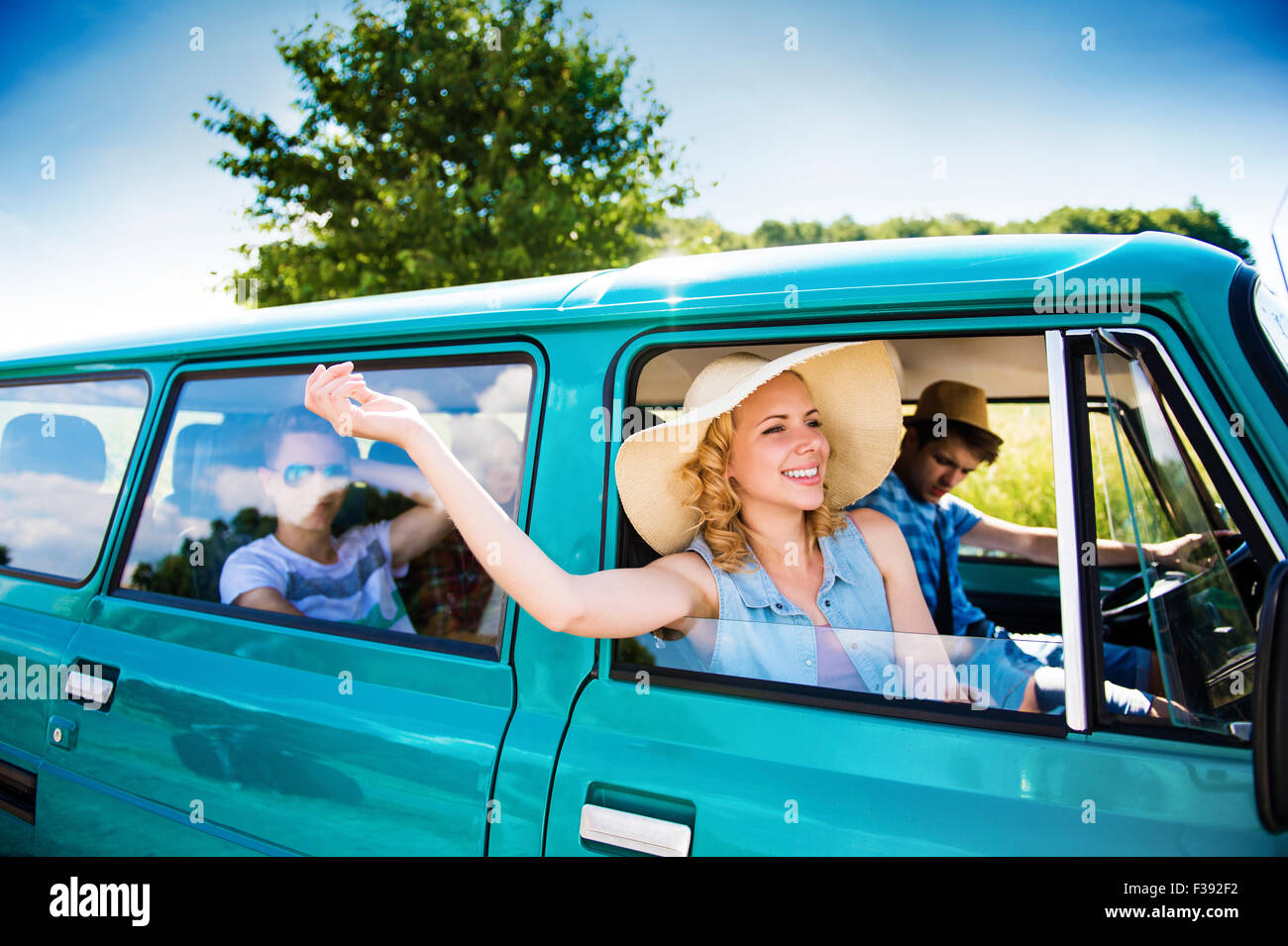 Young people on a road trip Stock Photo - Alamy