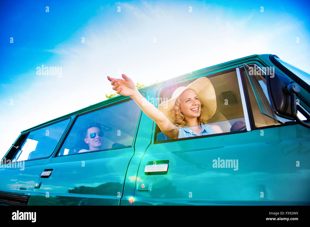 Young people on a road trip Stock Photo - Alamy