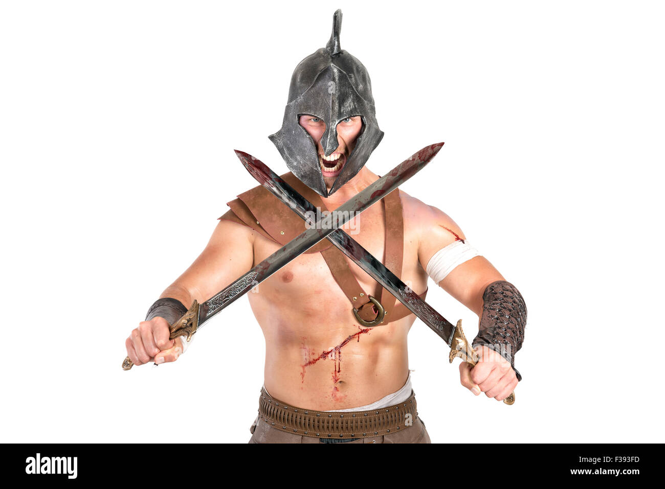 Gladiator posing isolated in a white background Stock Photo - Alamy