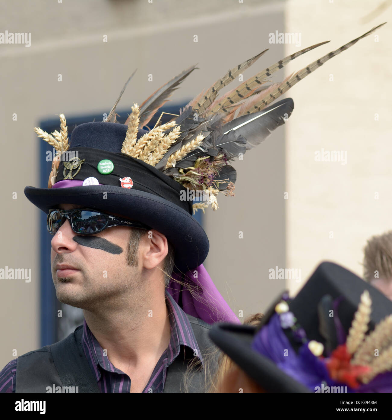 Morris Dancer wearing top hat with feathers at the Castle Road 1 day ...