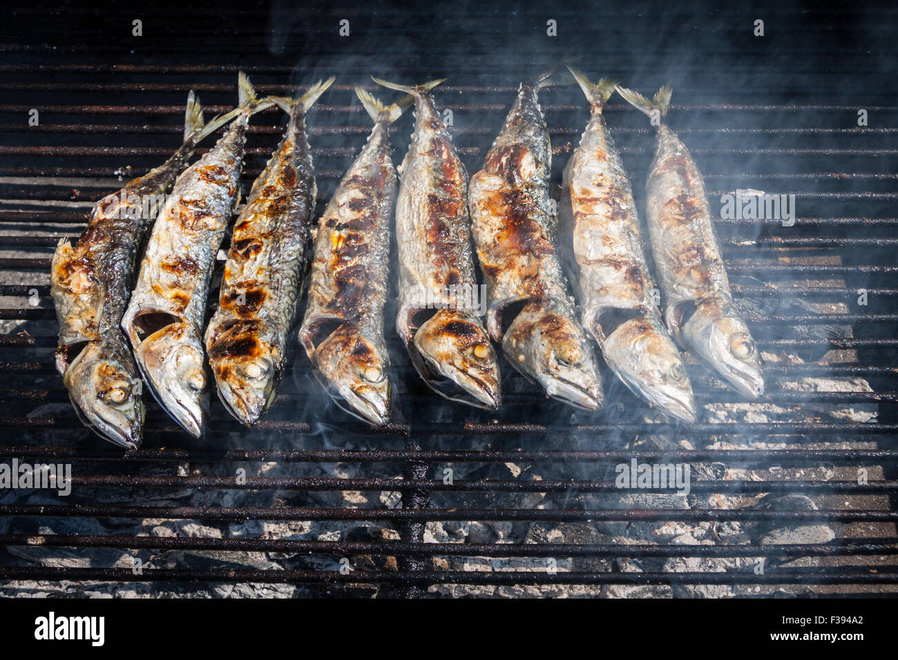 Flame grilled fish hi-res stock photography and images - Alamy