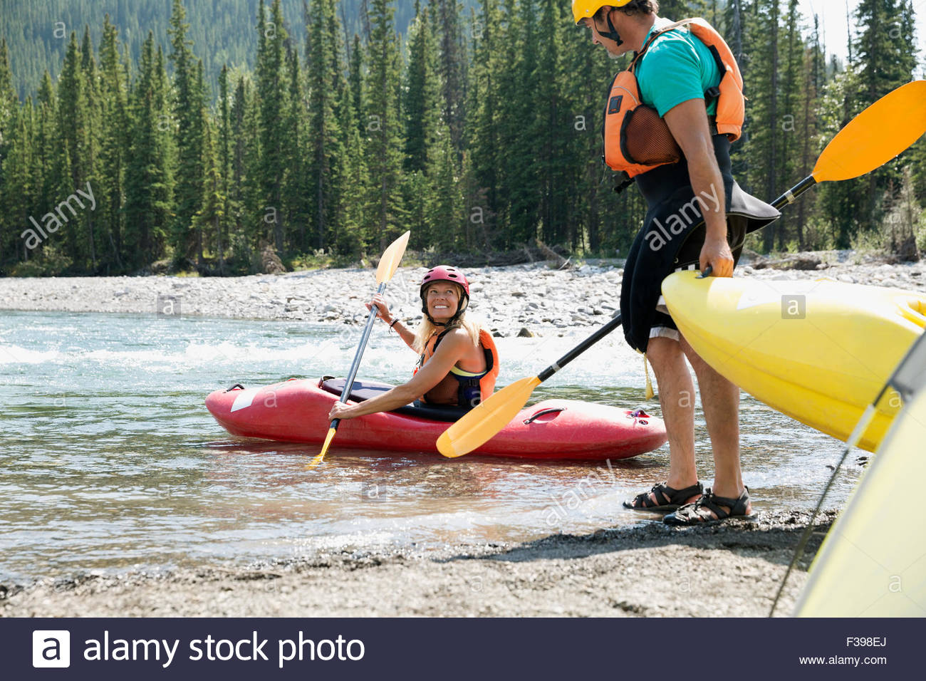 Man pulling kayak hi-res stock photography and images - Alamy