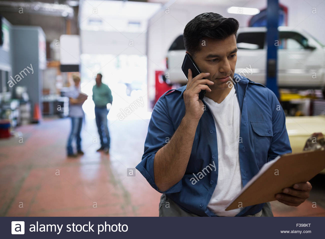 Indian business women talking on phone hi-res stock photography and ...