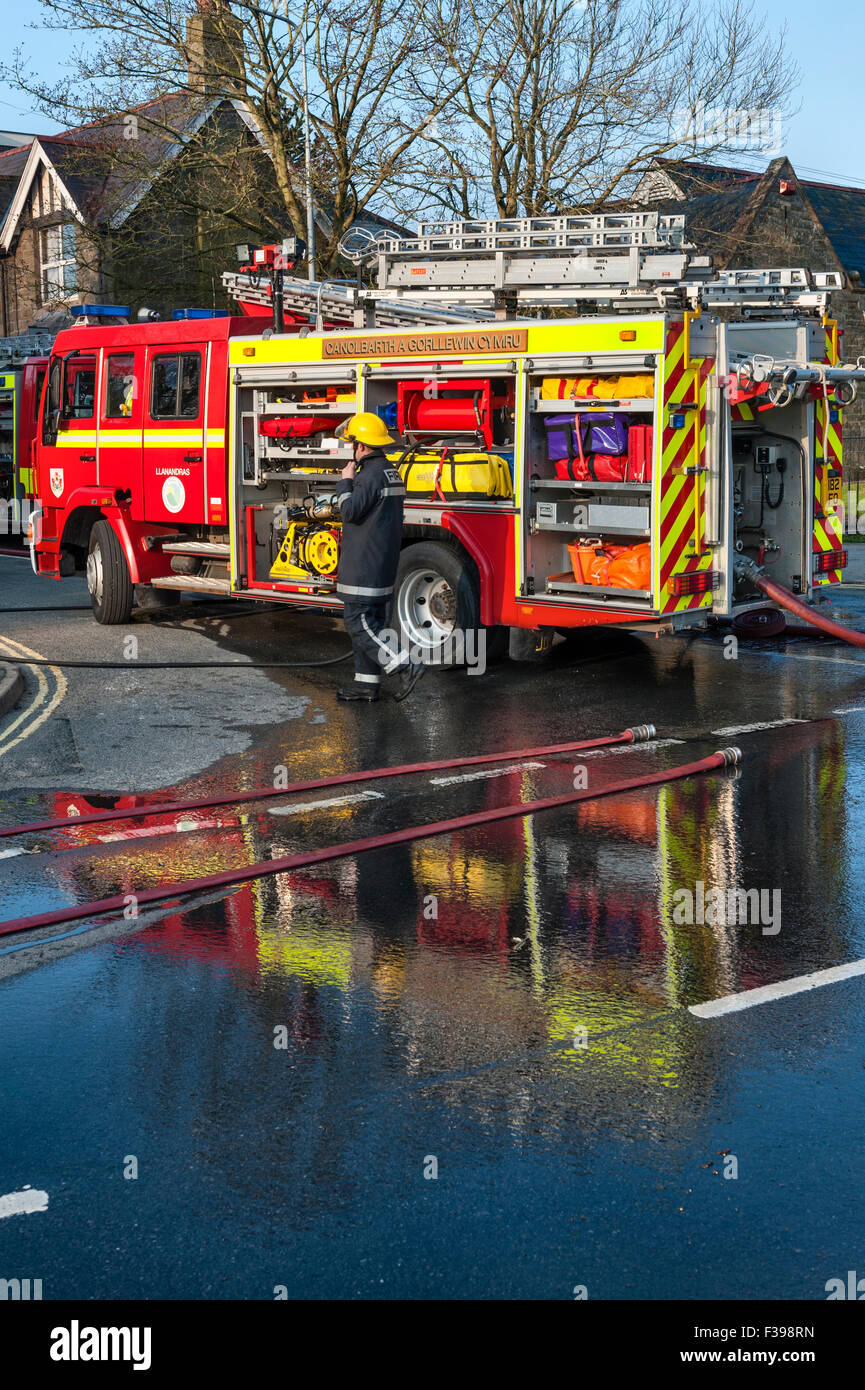 Teams from the Mid-Wales Fire and Rescue Service attend a fire in an ...