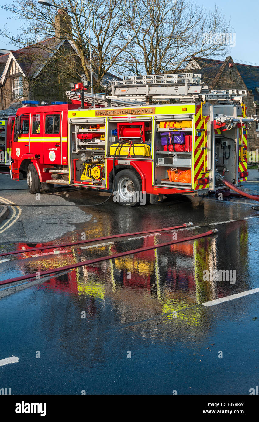 Teams from the Mid-Wales Fire and Rescue Service attend a fire in an ...