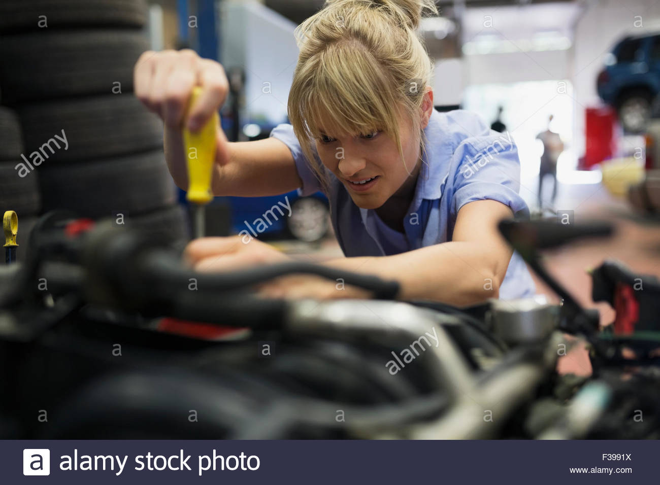 Fixing engine hi-res stock photography and images - Alamy