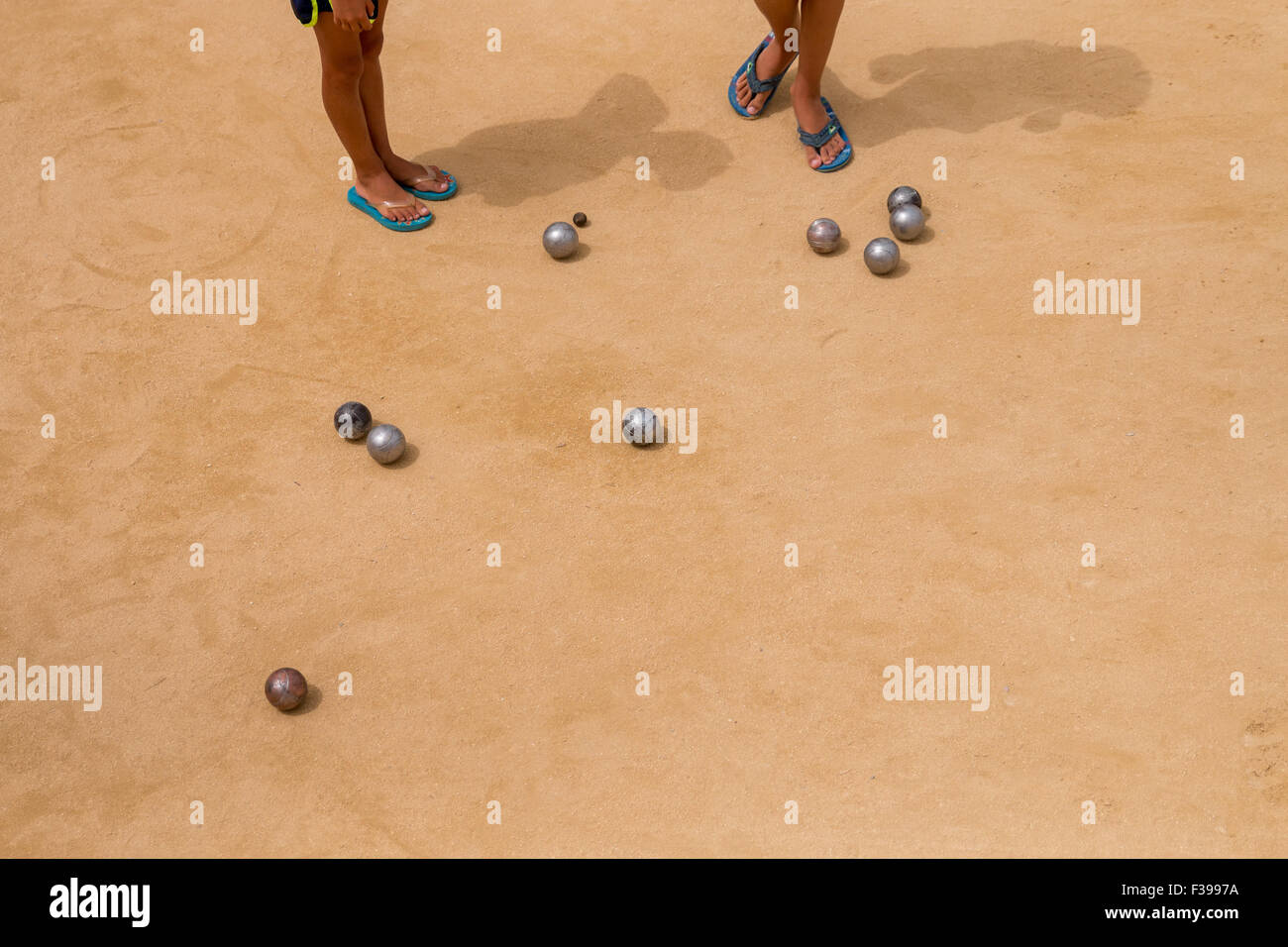 The game of Petanca being played at the beach Stock Photo - Alamy