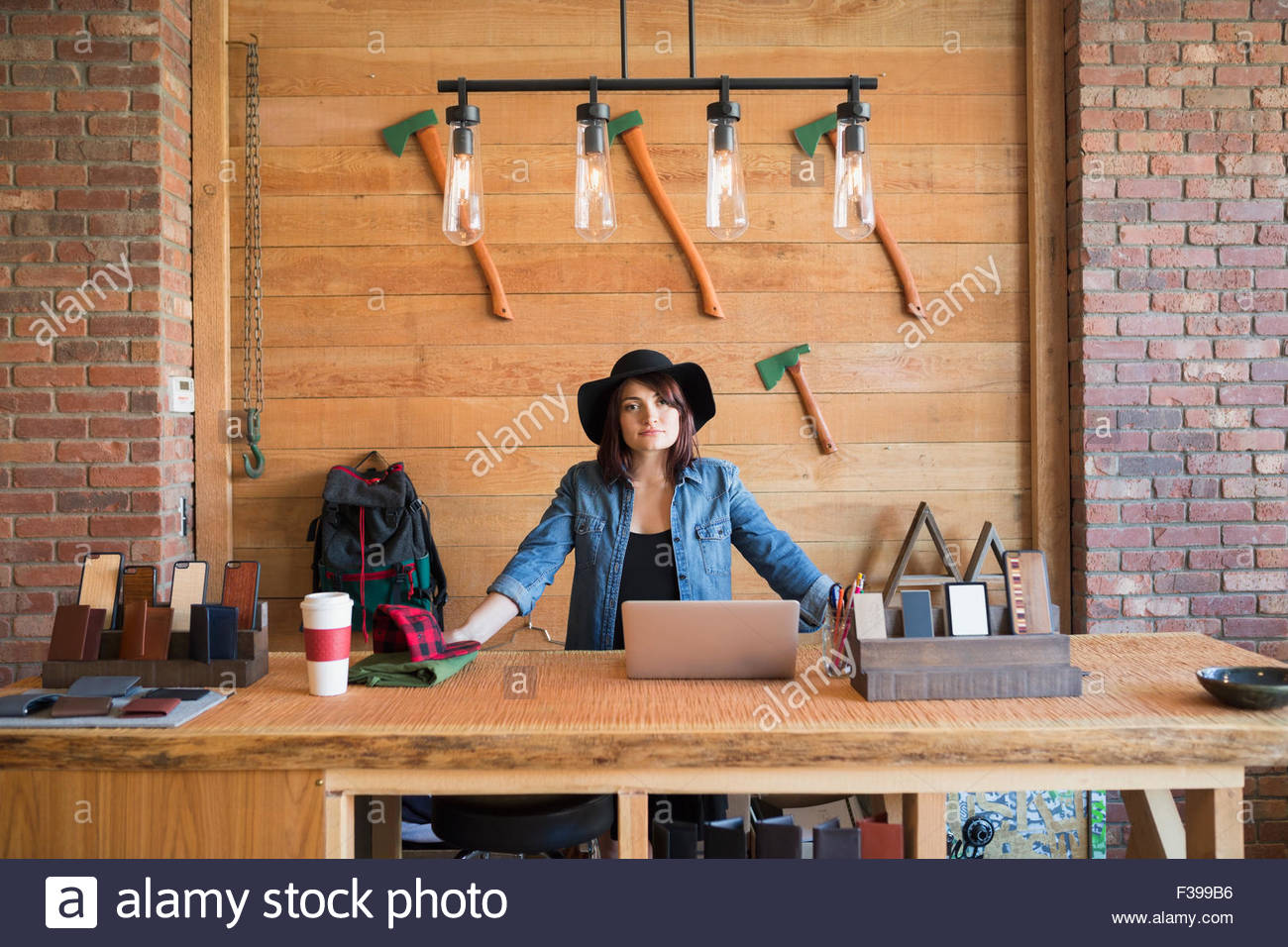 Young woman behind shop counter hi-res stock photography and images - Alamy