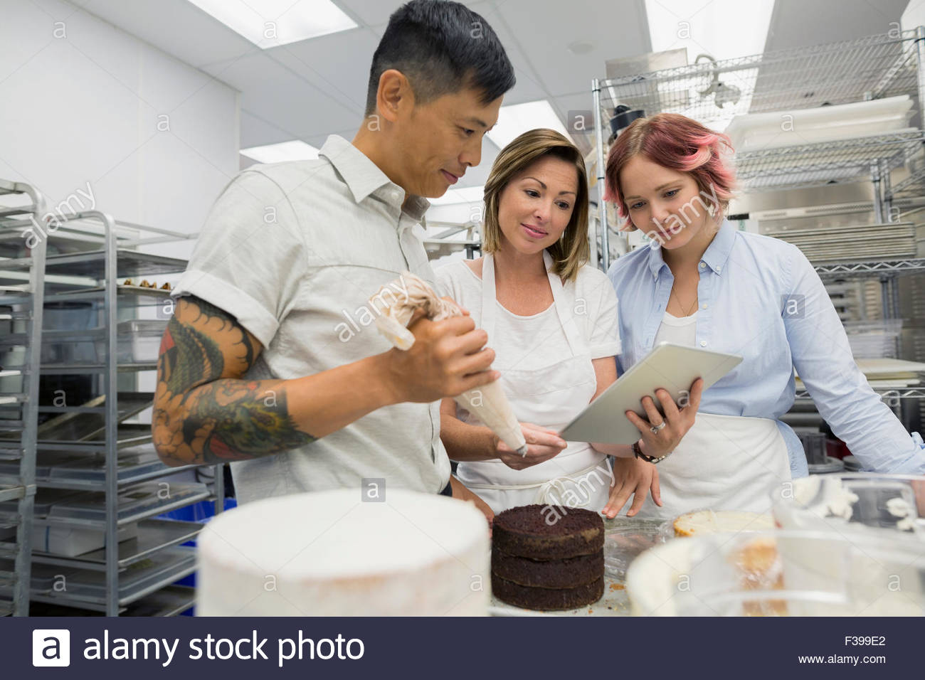 Group of chefs in kitchen hi-res stock photography and images - Alamy