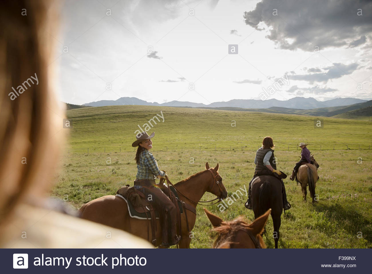Woman riding horse back hat hi-res stock photography and images - Alamy